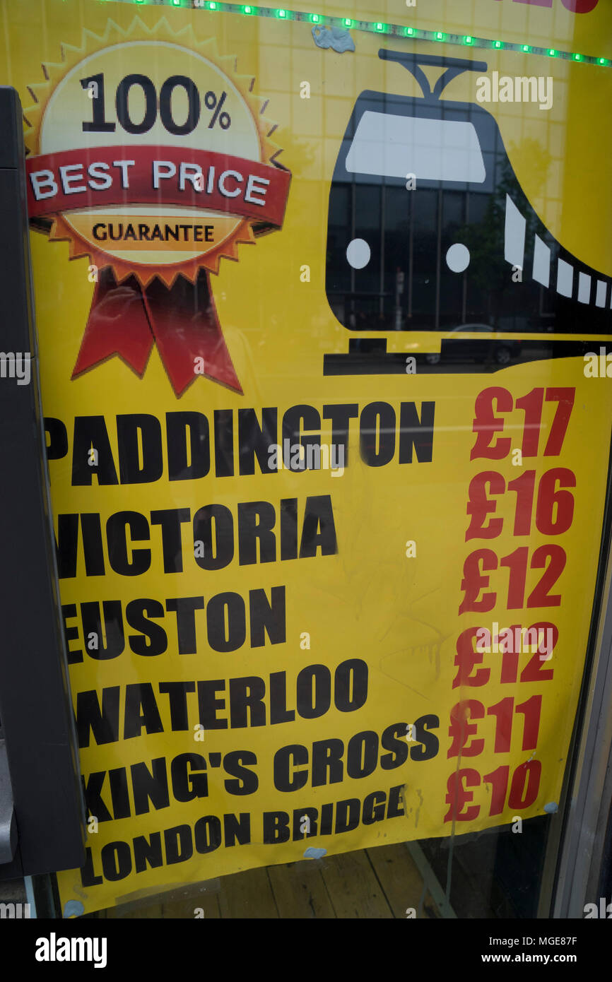 Mini cab services advertised on a shop in in Hoxton, London,England,UK ...