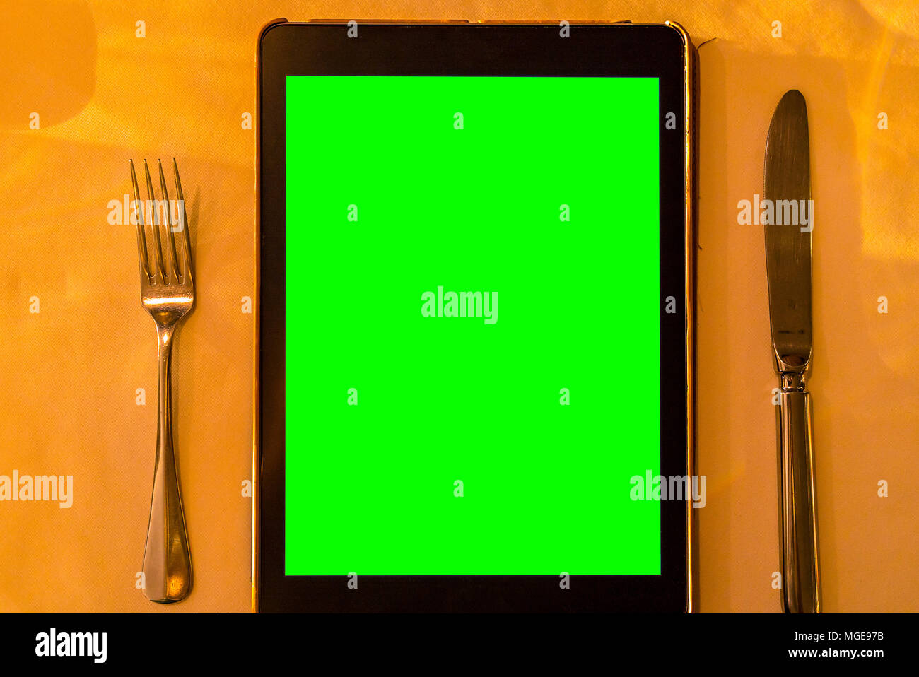 Tablet using as menu in restaurant Stock Photo - Alamy