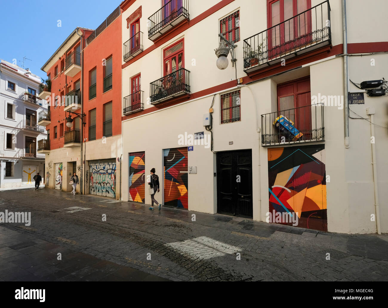 Street scene showing examples of colourful street art used to decorate ...