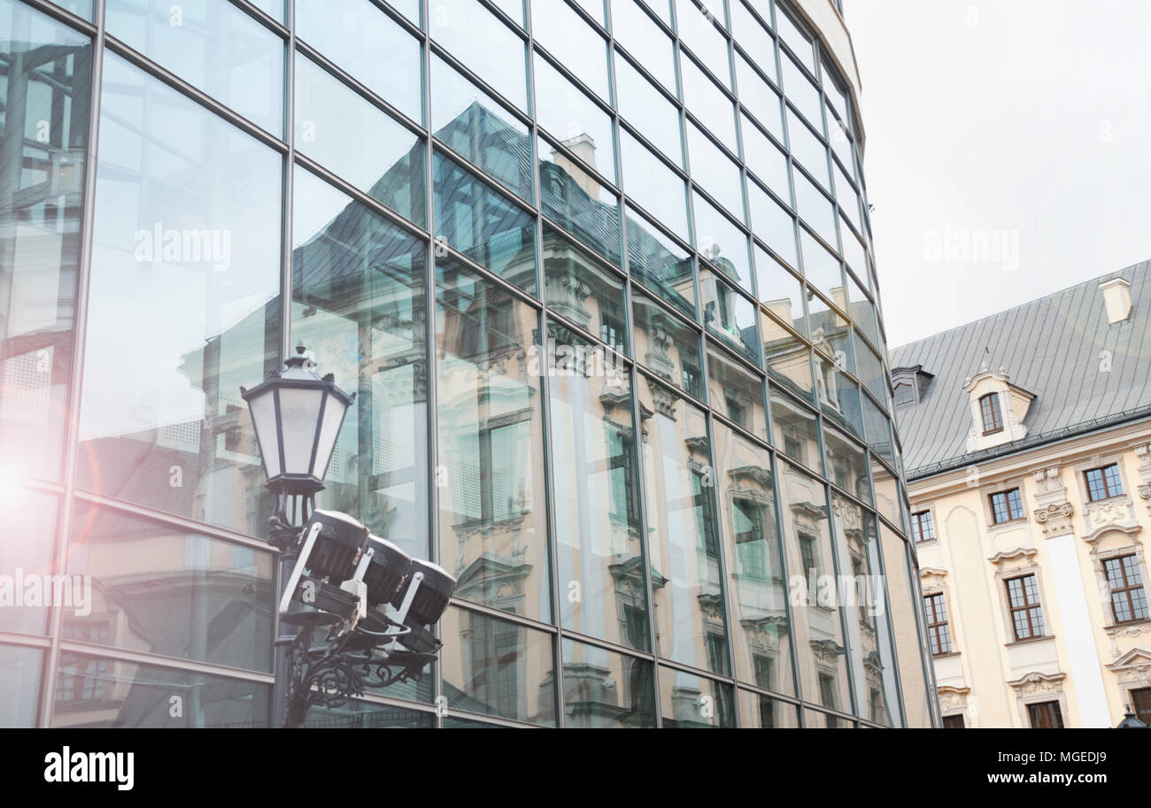 Old house reflection in modern glass building. Poland, Wroclaw Stock ...