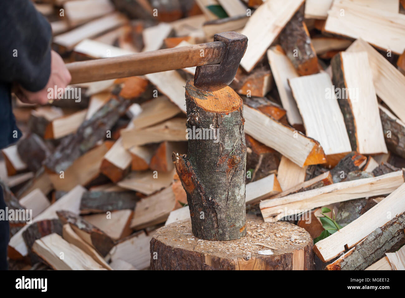 Preparation of firewood for the winter. firewood background, Stacks of ...