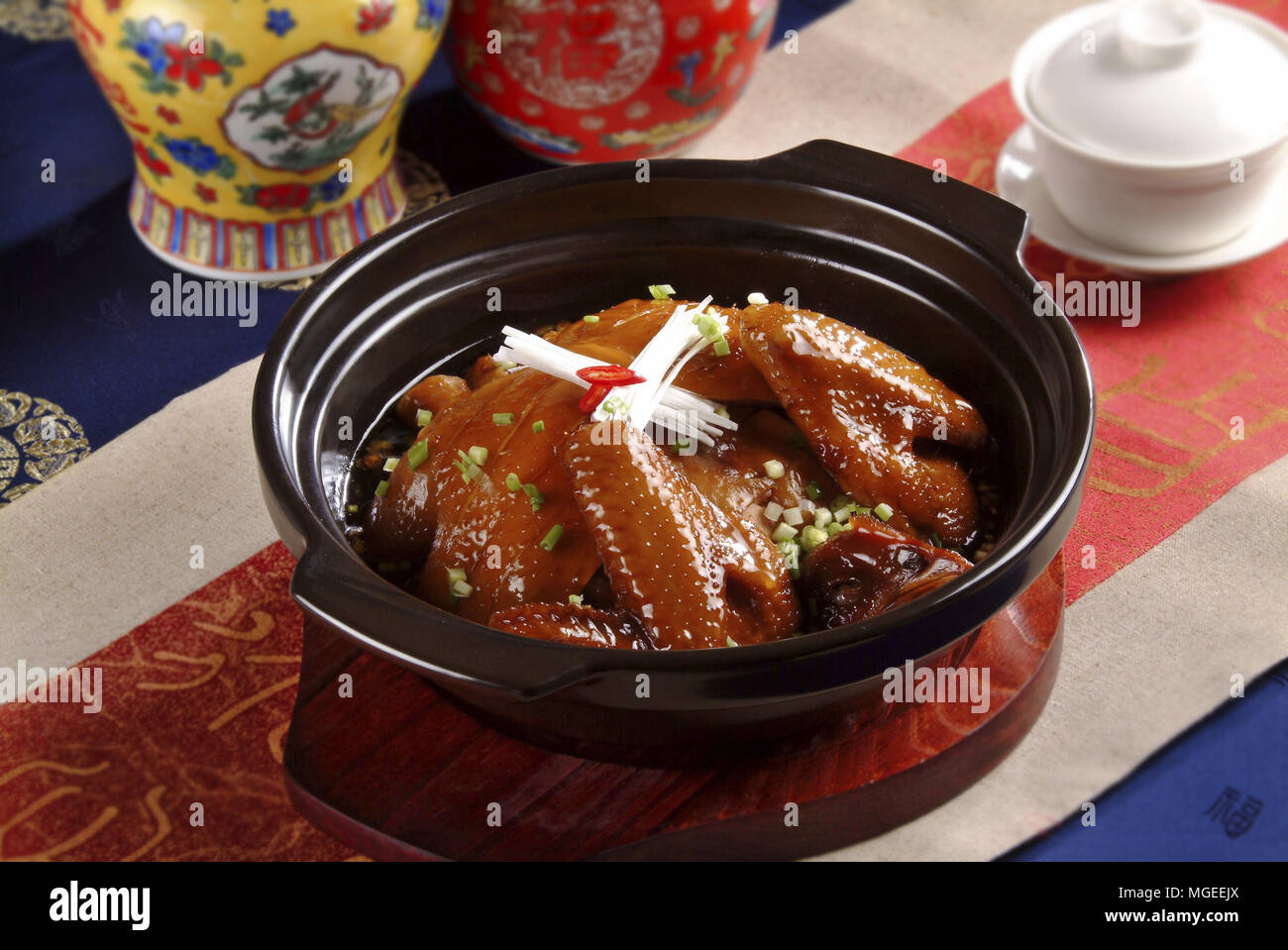 aged chinese wine with cooking pot Stock Photo - Alamy