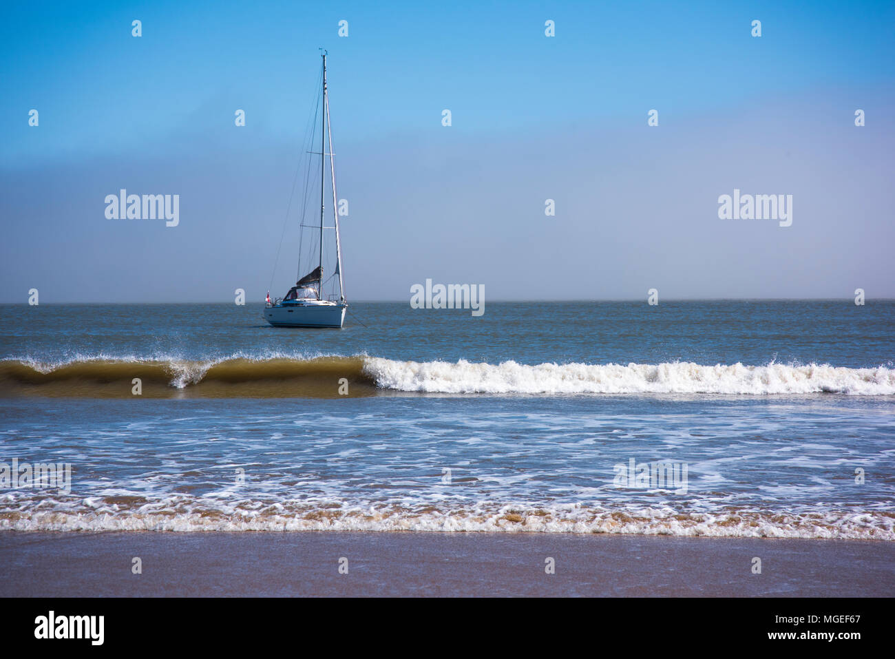 Yacht moored off Pwlldu Bay, Gower, South Wales, UK Stock Photo - Alamy