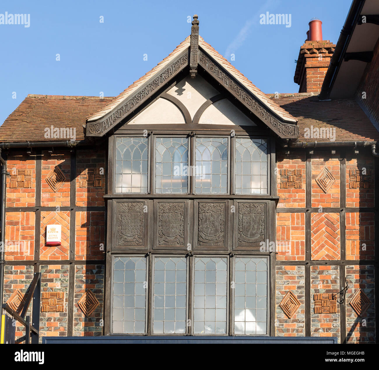 Facade of historic 1925 building heraldic symbols and signs, 105 High ...