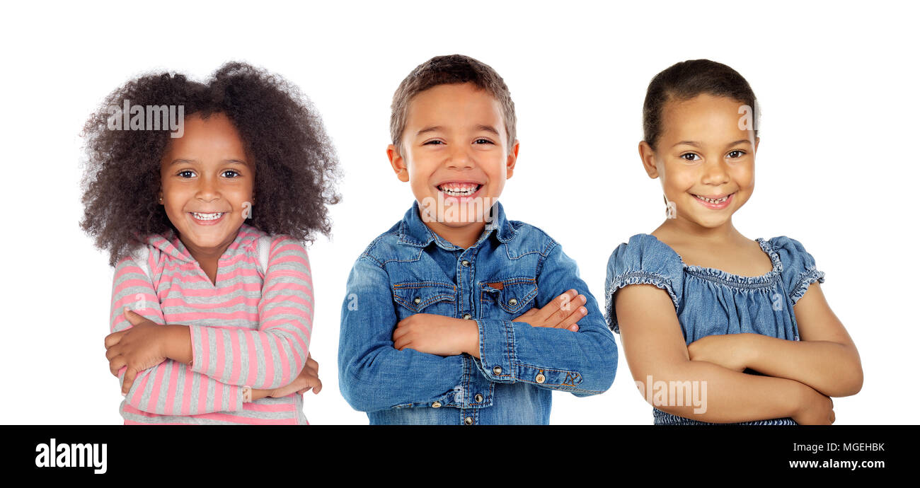 Three latin children crossing their arms isolated on a white background ...