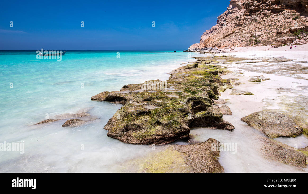 Beautiful calm coast of the ocean and the rock Stock Photo - Alamy