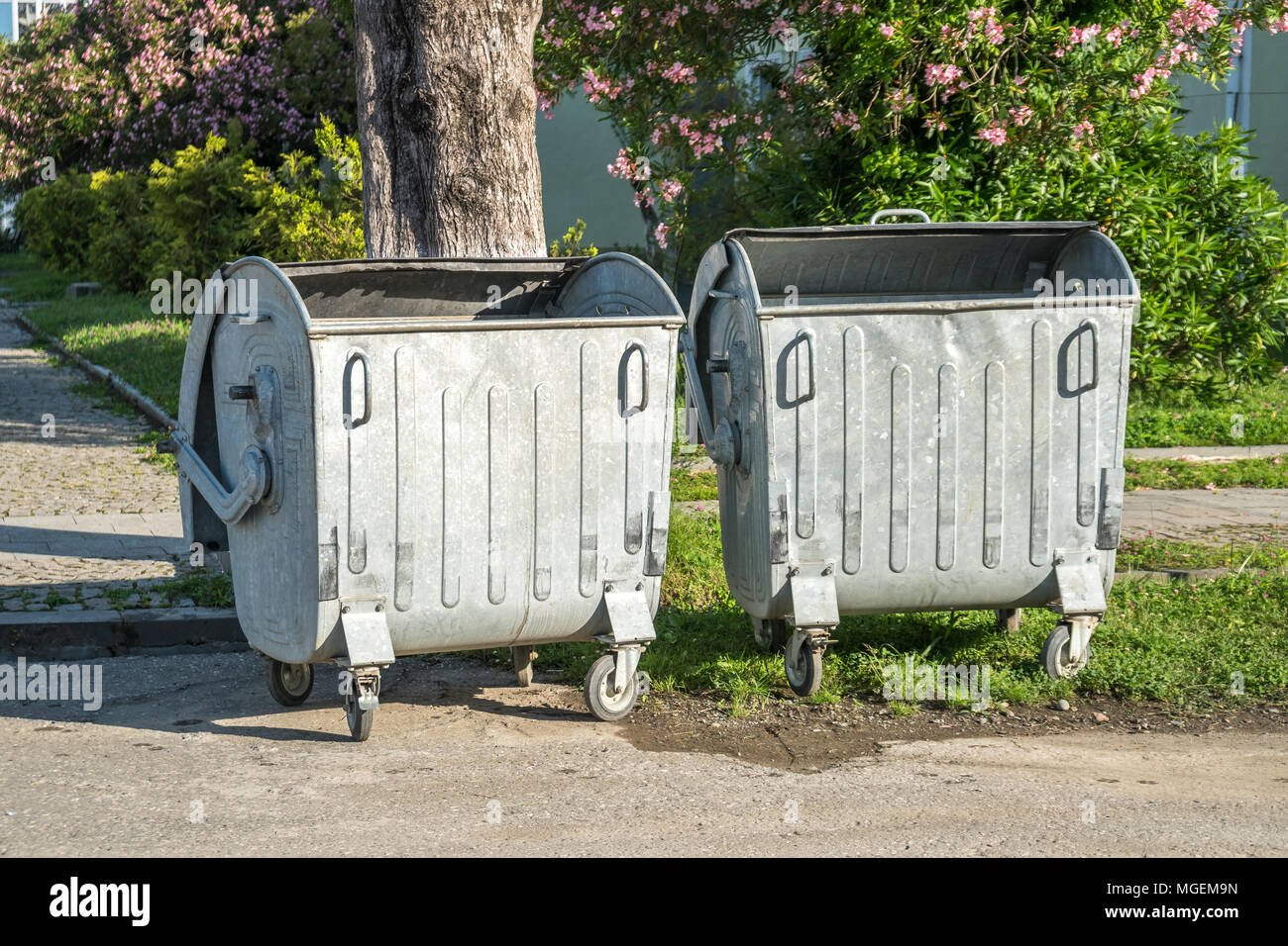 Big metal recycling containers on the street Stock Photo - Alamy