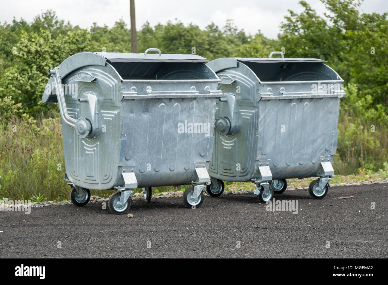 Big metal recycling containers on the street Stock Photo - Alamy