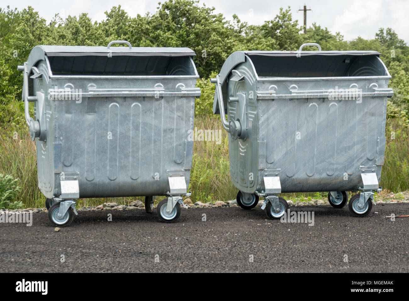 Big metal recycling containers on the street Stock Photo - Alamy