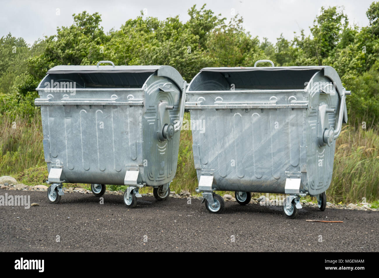 Big metal recycling containers on the street Stock Photo - Alamy