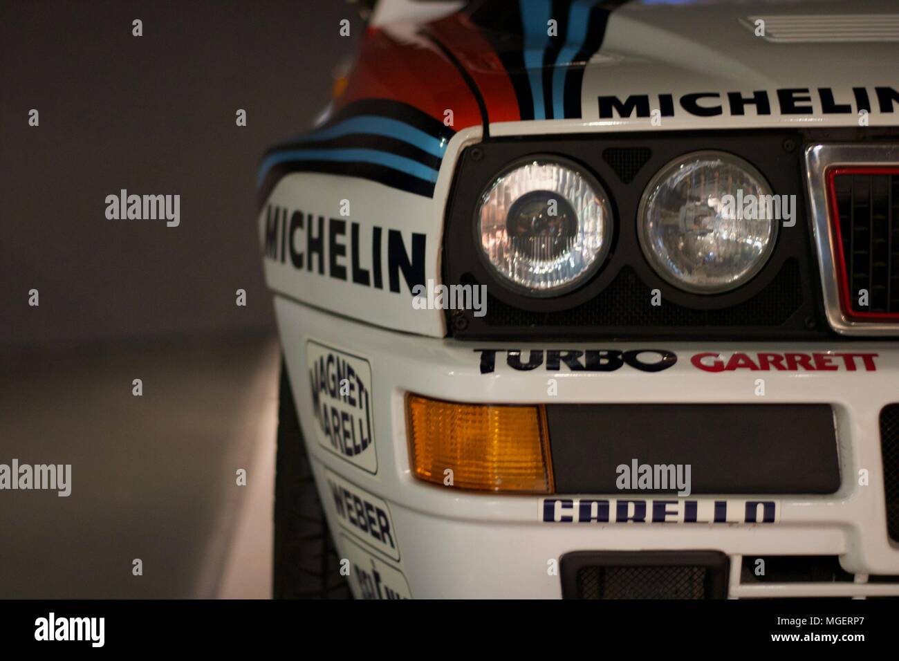 Side by side of a Lancia Delta Integrale, the side of the machine is ...