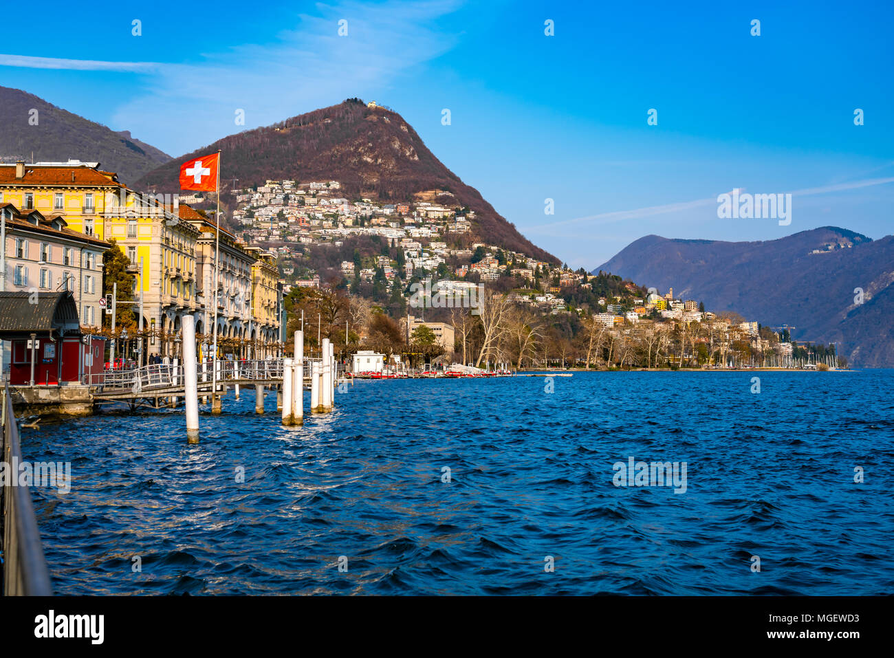LUGANO, SWITZERLAND - MARCH 25, 2018 : Coastal landscape of Lake Lugano ...