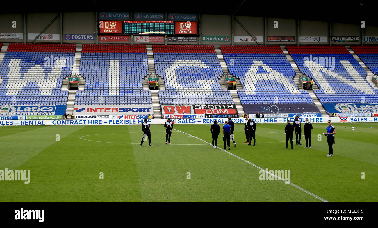 The AFC Wimbledon team inspect the pitch before the Sky Bet League One ...