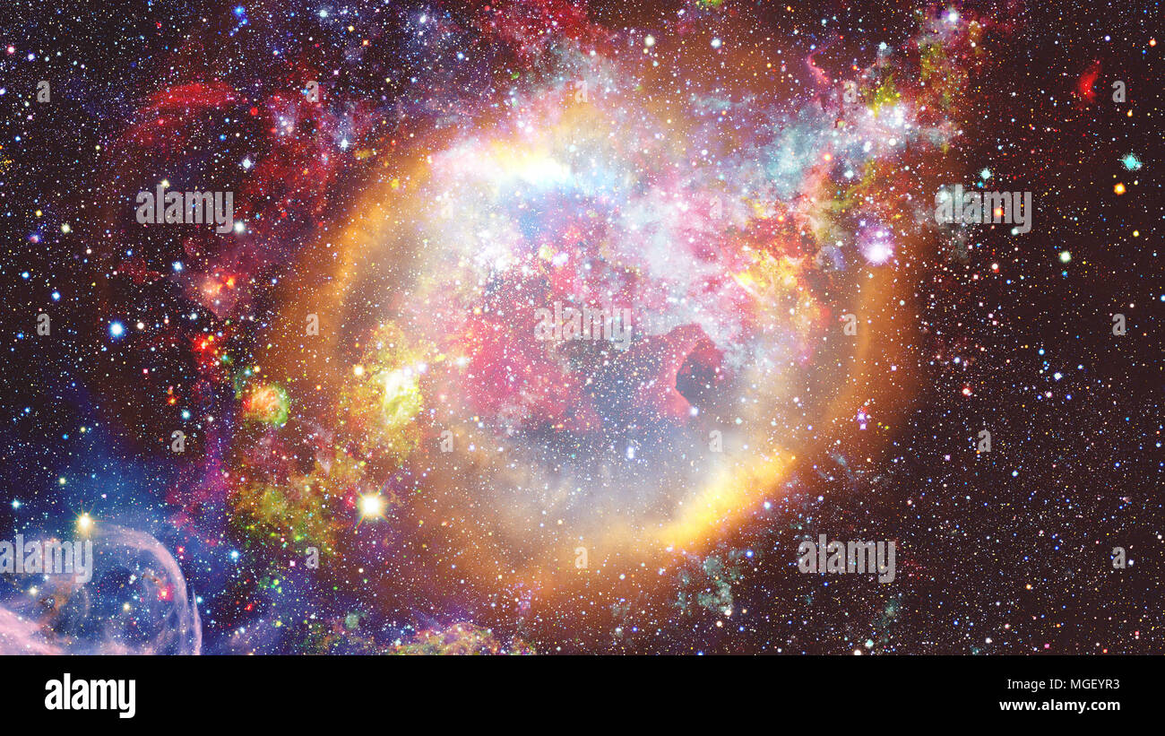 Colored clouds in nebula. Combined version of Hubble space telescope ...