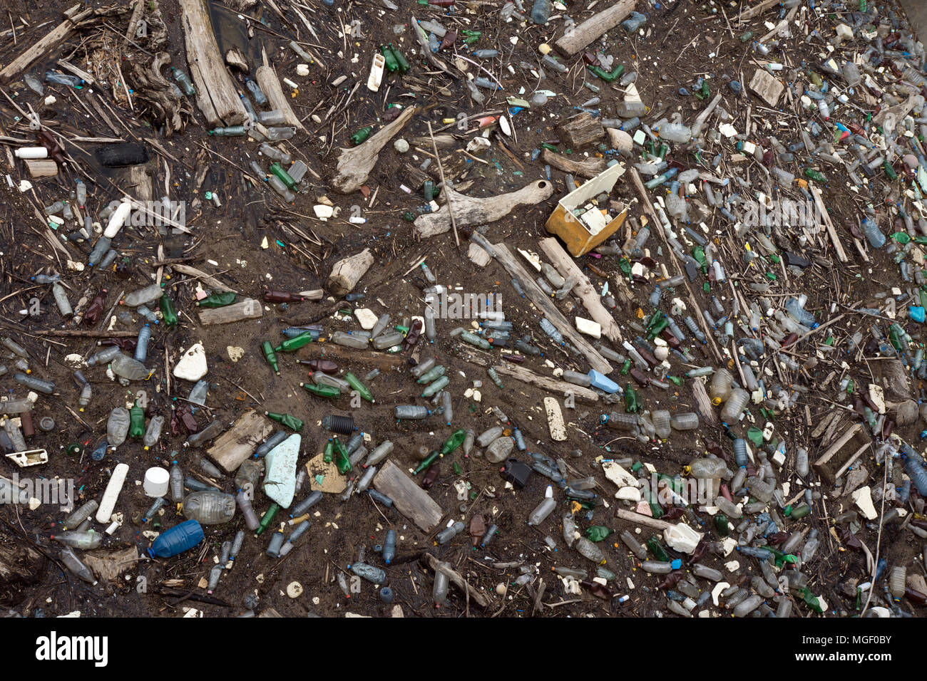 Ecological pollution of water bodies. Garbage floating in water Stock ...