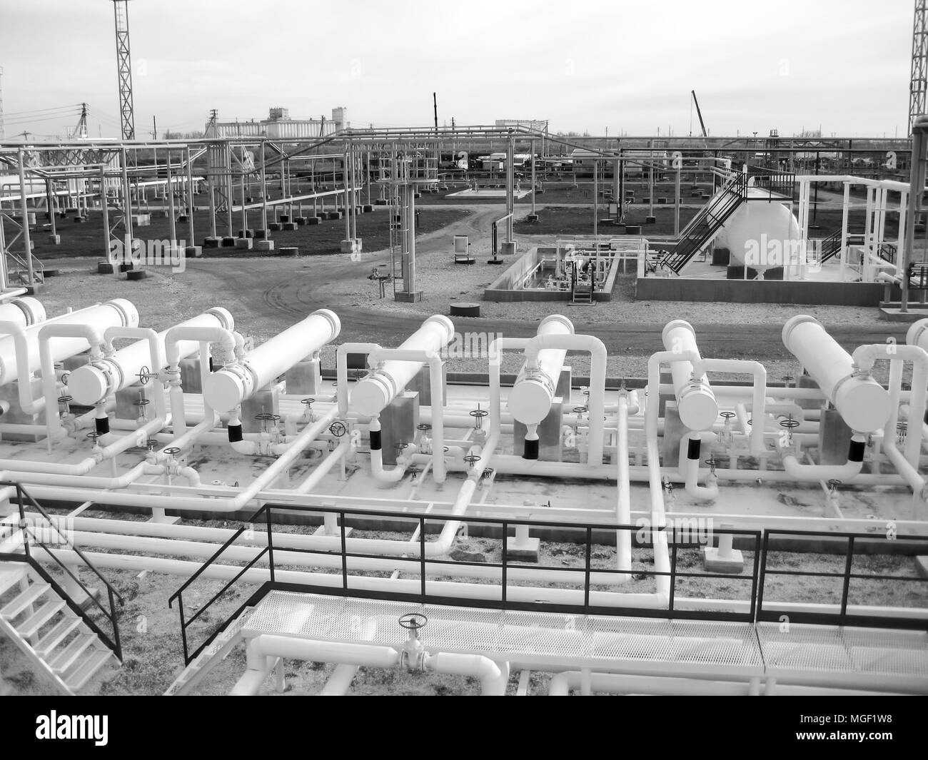 Heat exchanger in an oil refinery Black and White Stock Photos & Images ...