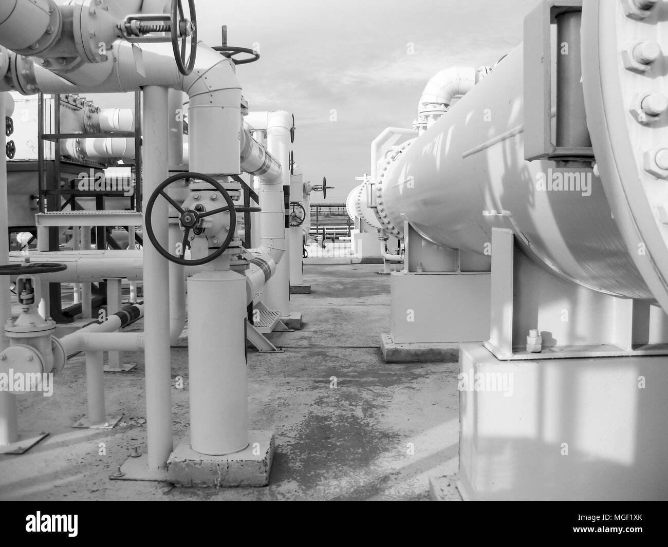 Heat exchangers in a refinery. The equipment for oil refining Stock ...