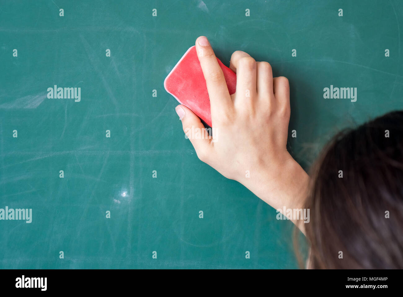 girls hand in elementary school cleaning board with sponge Stock Photo ...