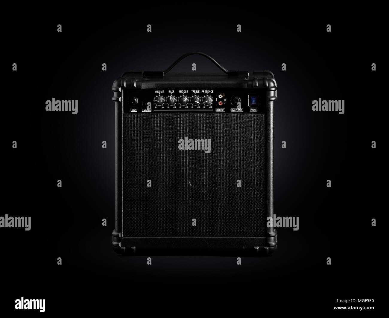 Black bass guitar amplifier on black background Stock Photo - Alamy