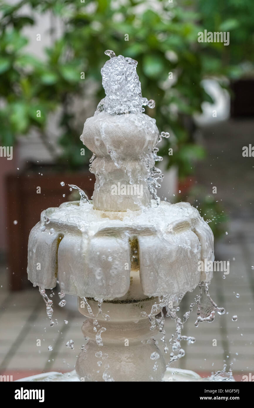 Close up water drops flowing from fountain Stock Photo - Alamy