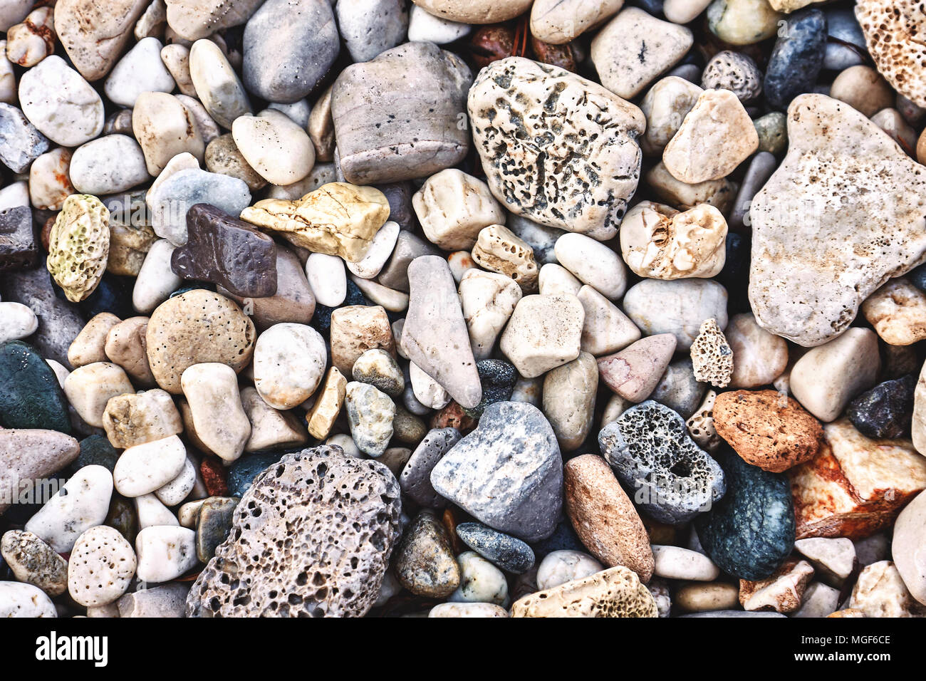 Colorful natural stones at the beach Stock Photo - Alamy