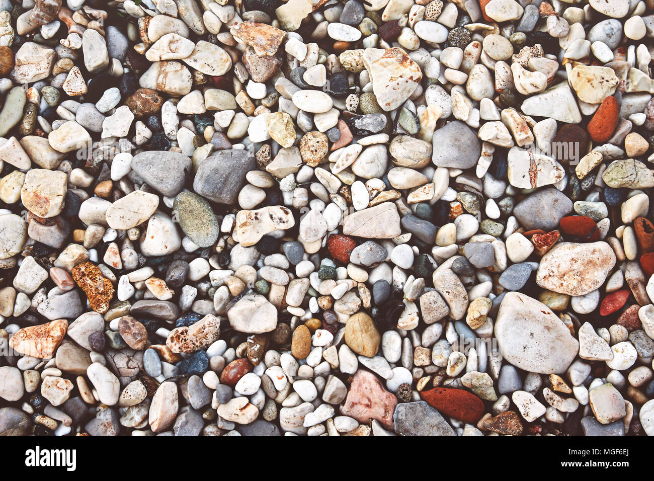 Colorful natural stones at the beach Stock Photo - Alamy