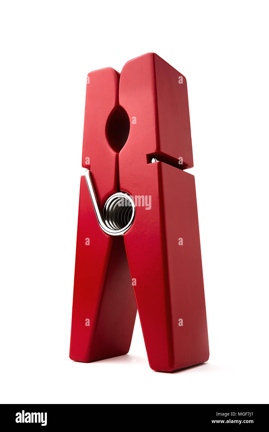 Big red clothespin on isolated white background Stock Photo - Alamy