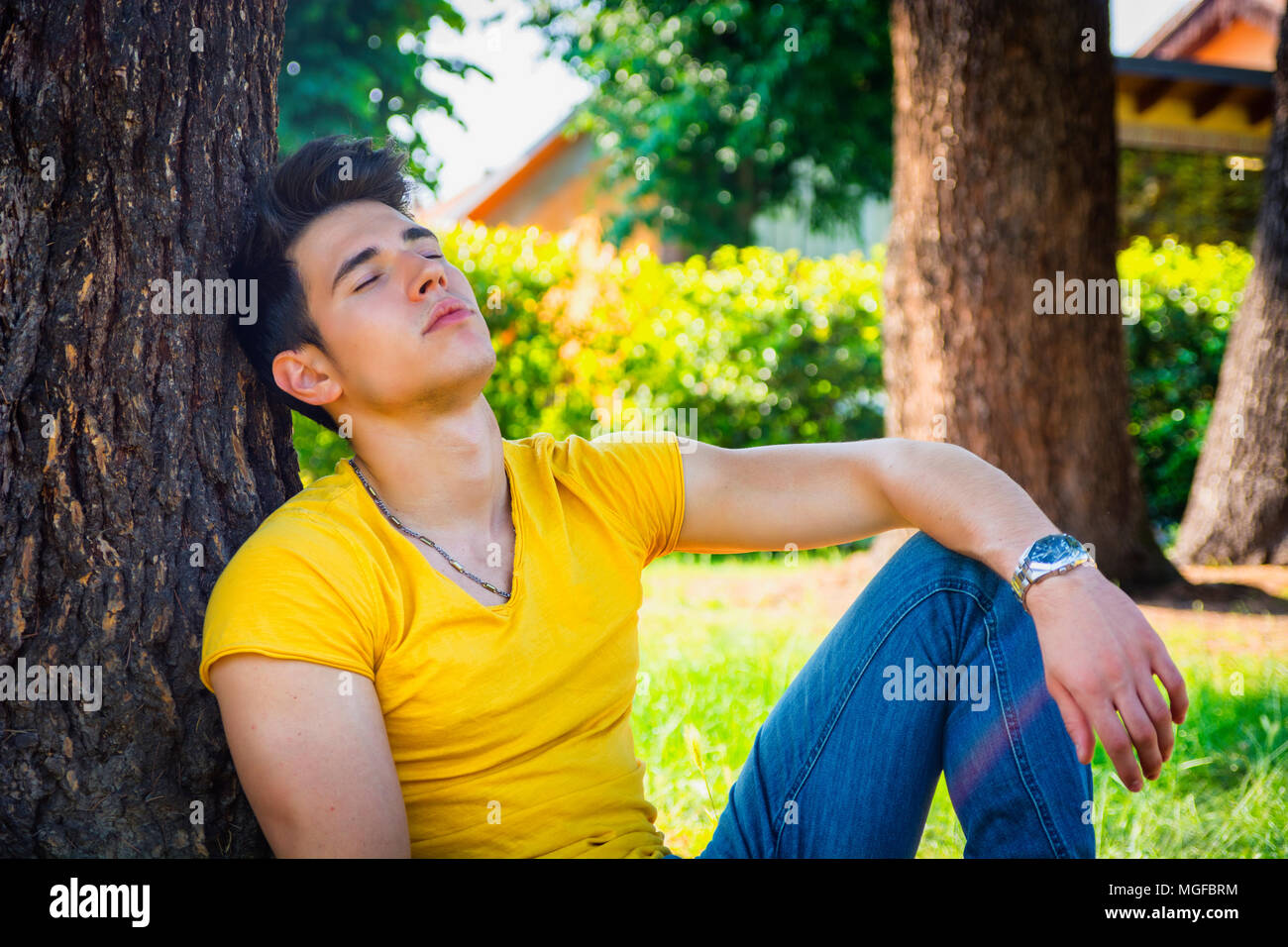 Resting against tree hi-res stock photography and images - Alamy