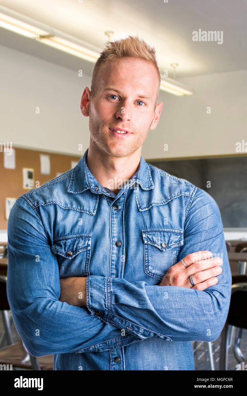 Handsome male student classroom hi-res stock photography and images - Alamy