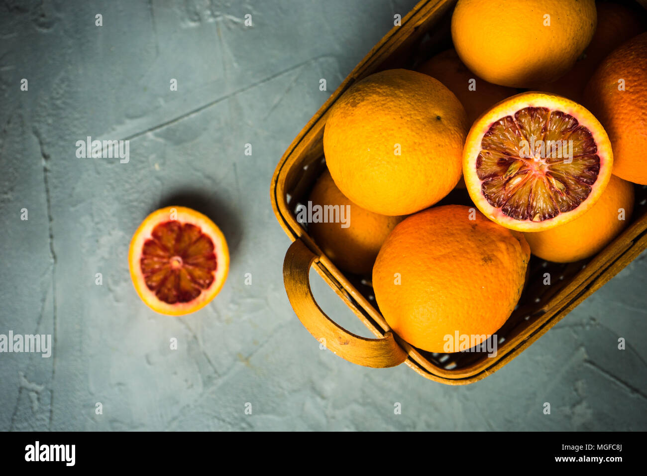 Vintage box full of organic red blood oranges on natural background ...