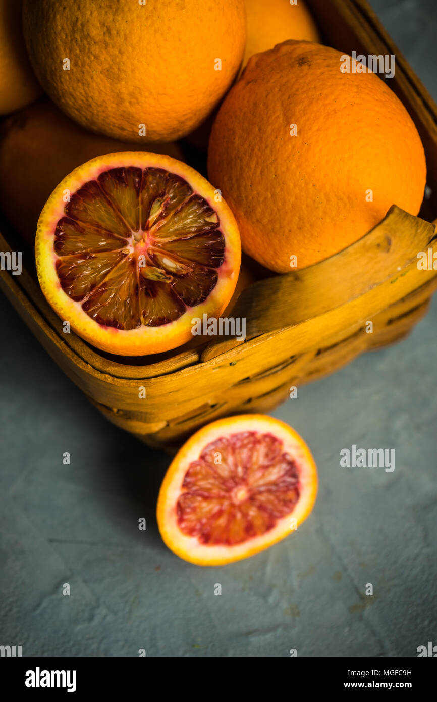 Vintage box full of organic red blood oranges on natural background ...