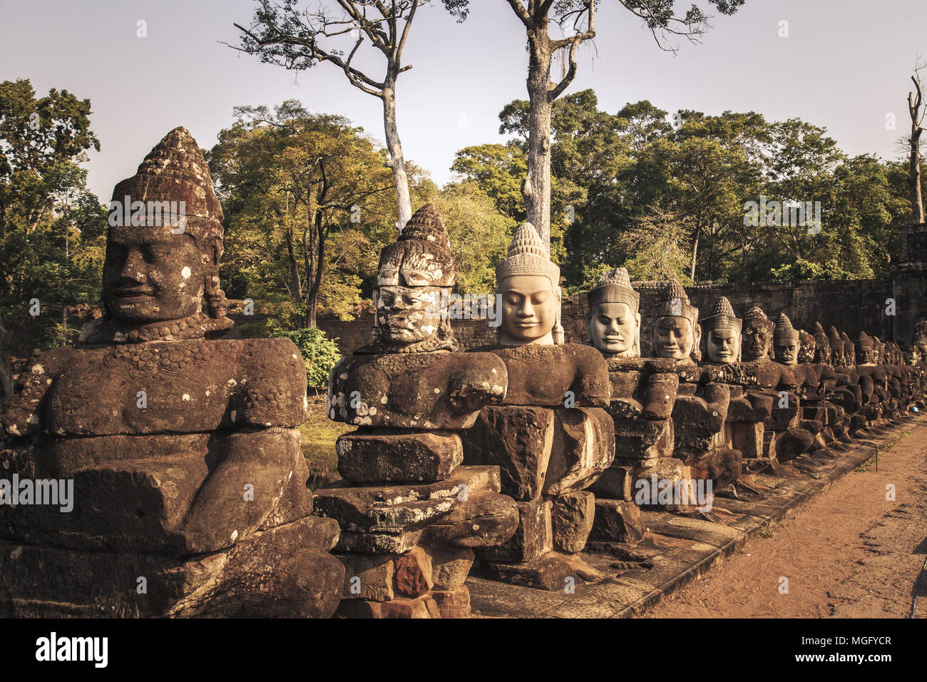 The bridge and the figures of gods and demons. Angkor, Siem Reap ...