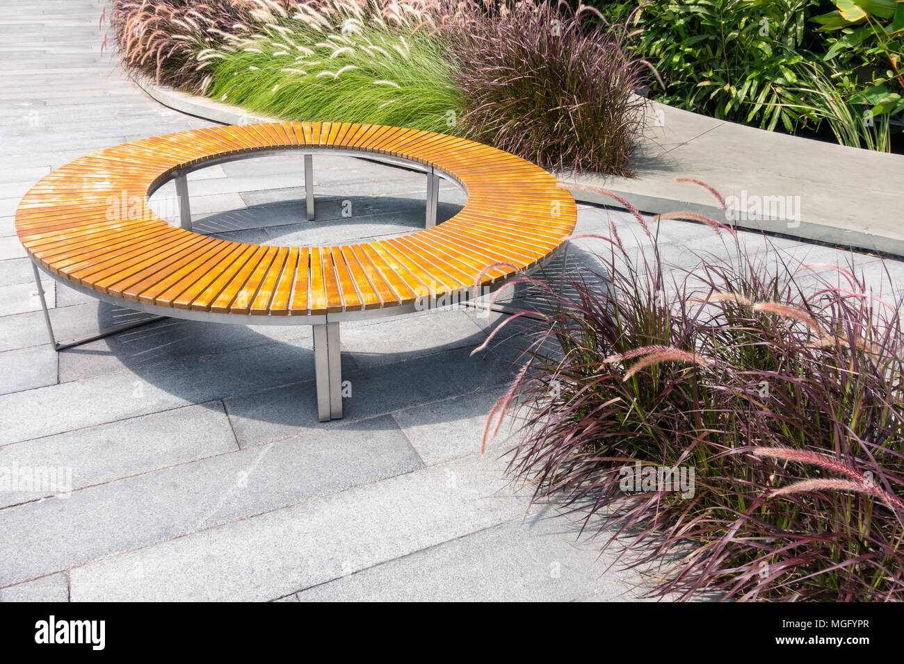 Wooden circle bench at outdoor park, Modern wooden bench Stock Photo ...