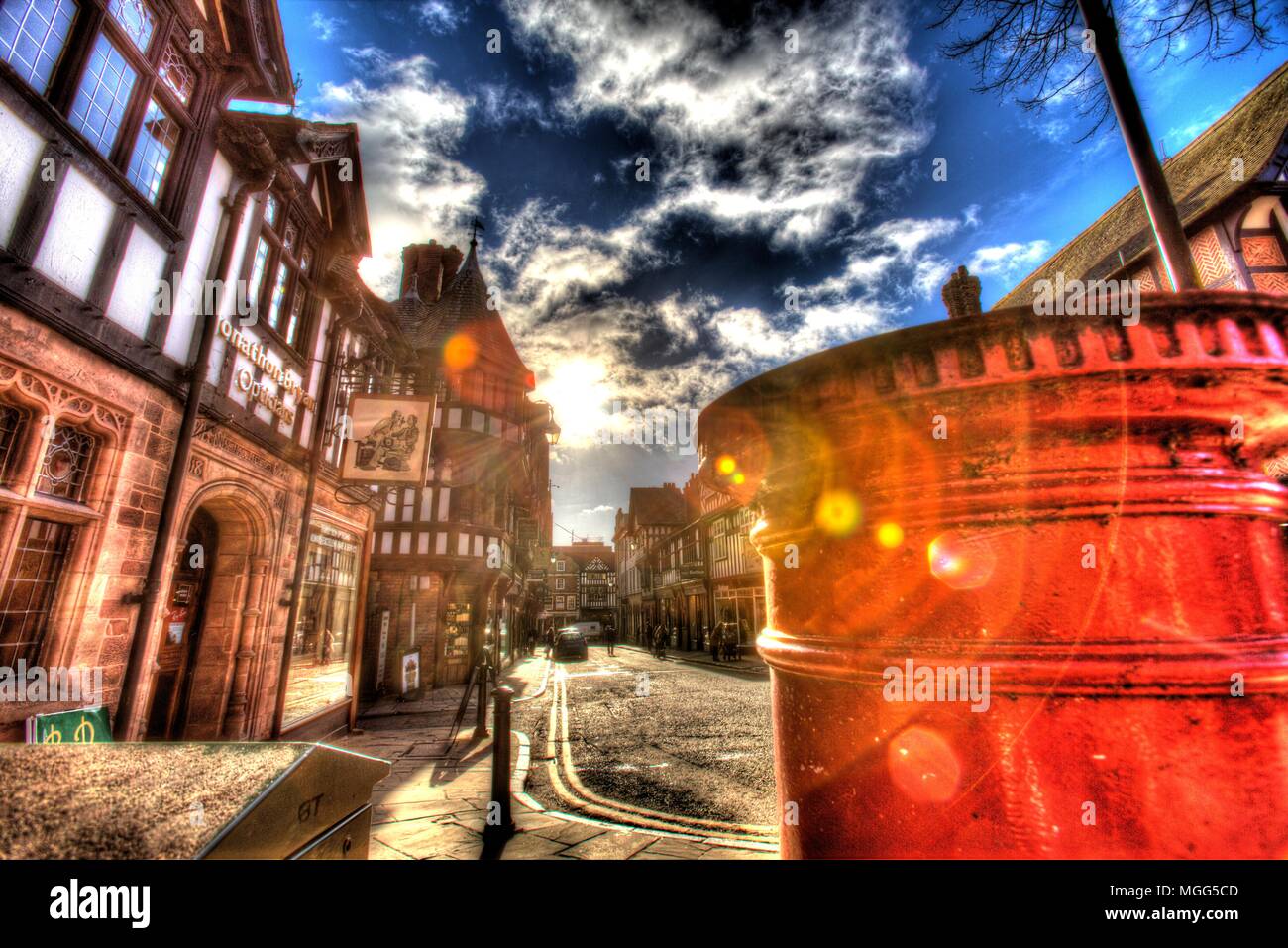 Red british post box in a city street hi-res stock photography and ...