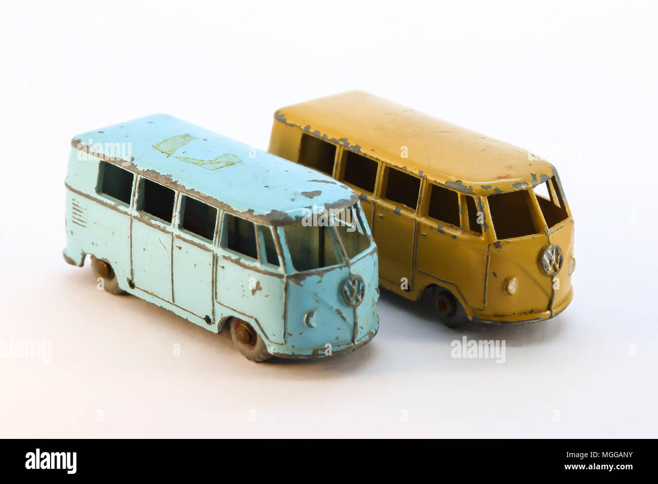 Two old VW Microbus Toys on white background Stock Photo - Alamy