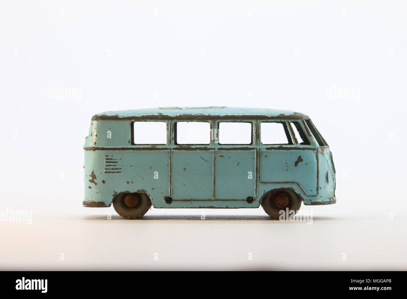 Side view of old blue VW Microbus Toy on white background Stock Photo ...