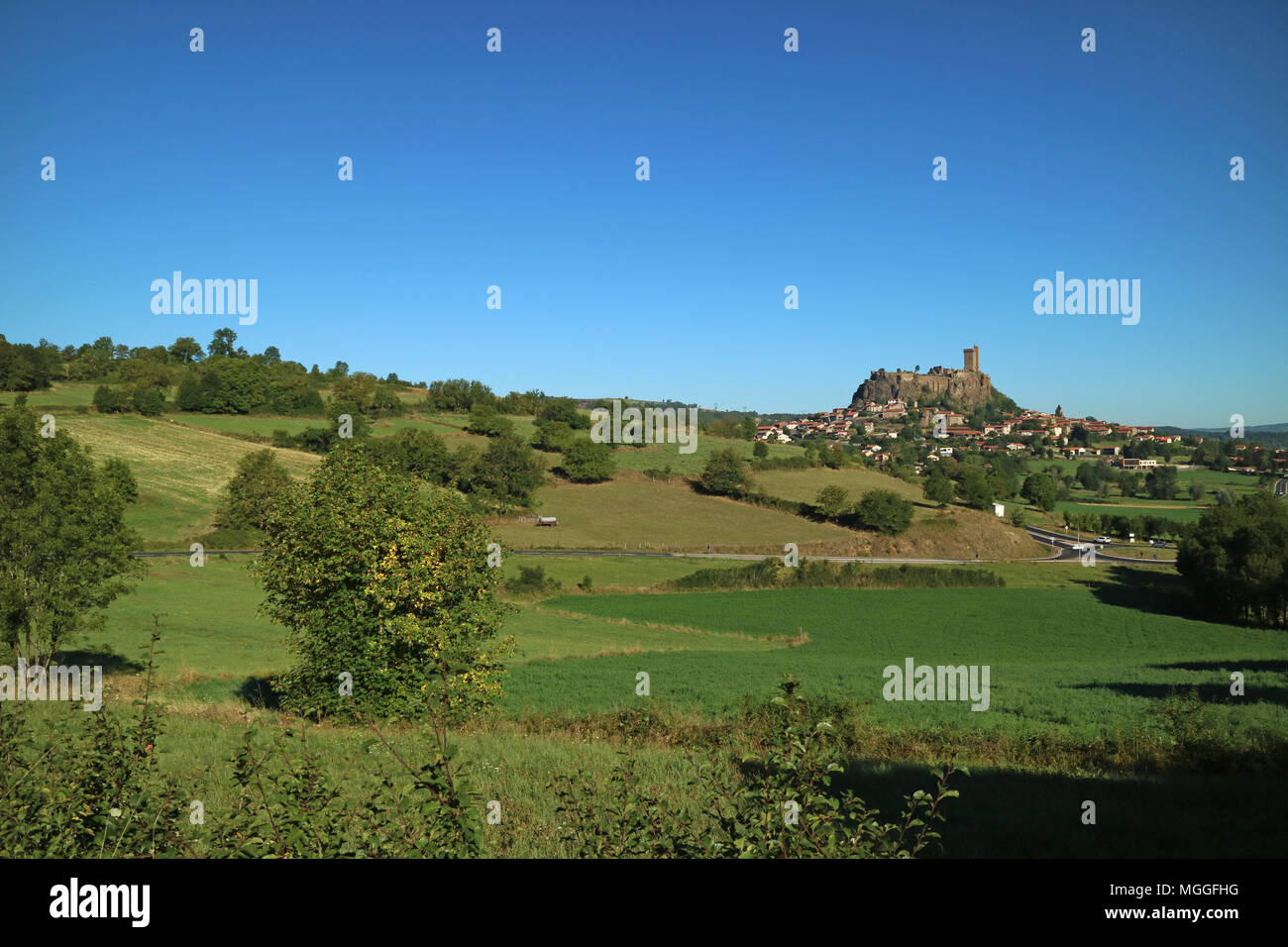 View of the town of Polignac, near le Puy-en-Velay,dominated by the ...