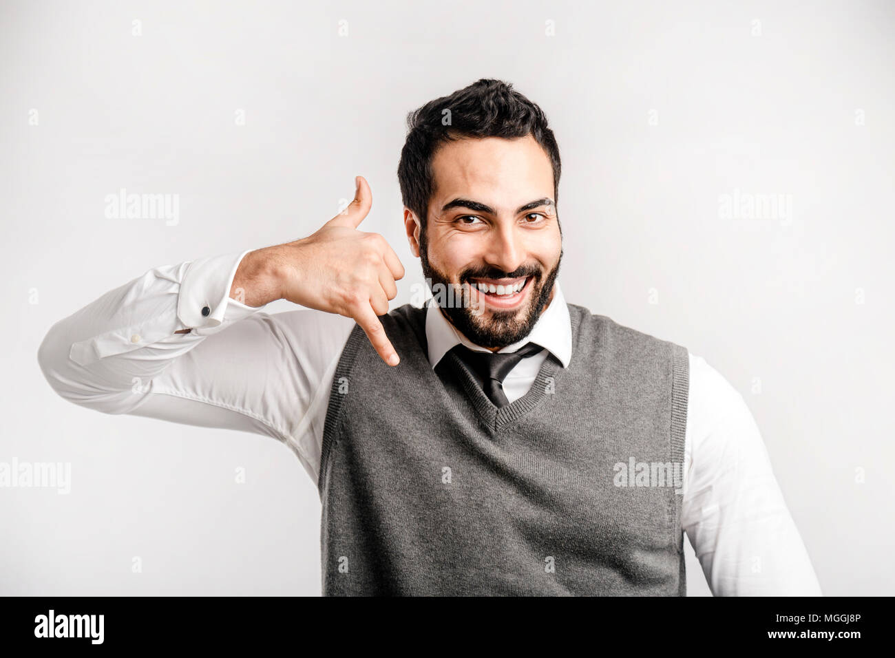 Man Shows Phone Sign Stock Photo - Alamy