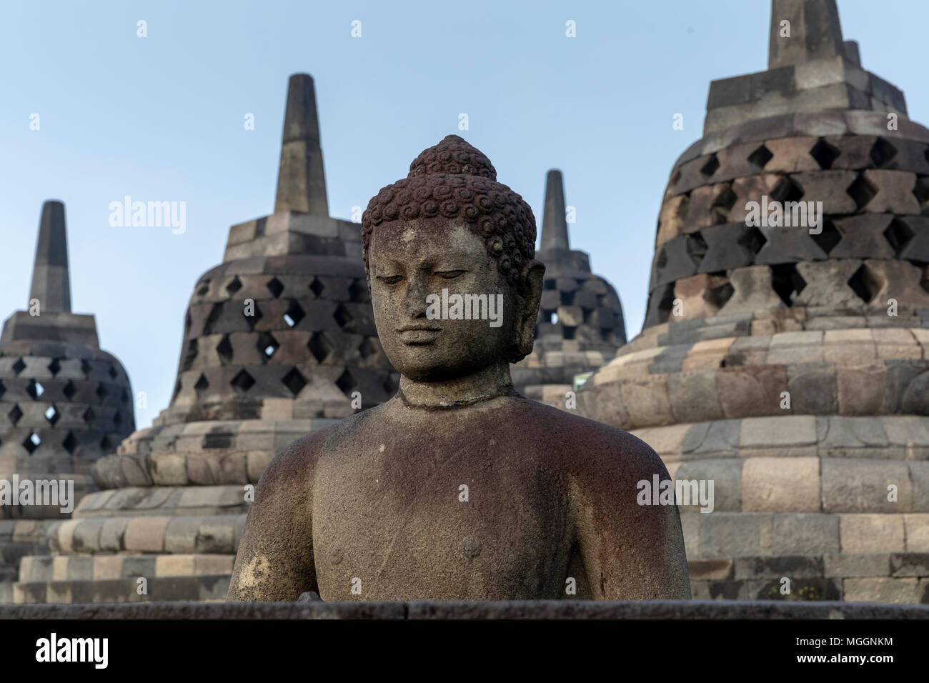 Buddha statue and stupas at Borobudur Buddhist Temple, Java, Indonesia ...