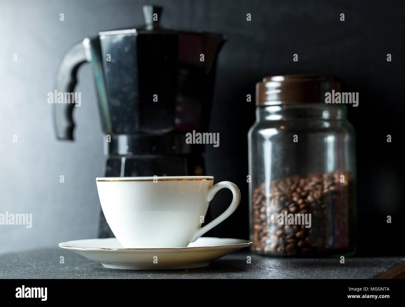 Coffee composition with tools for preparing espresso on dark background ...