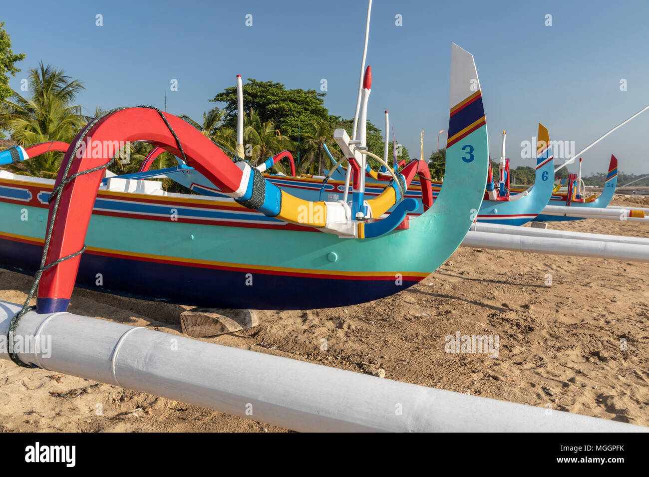 Balinese outrigger canoes on beach at Sanur, Bali Stock Photo - Alamy