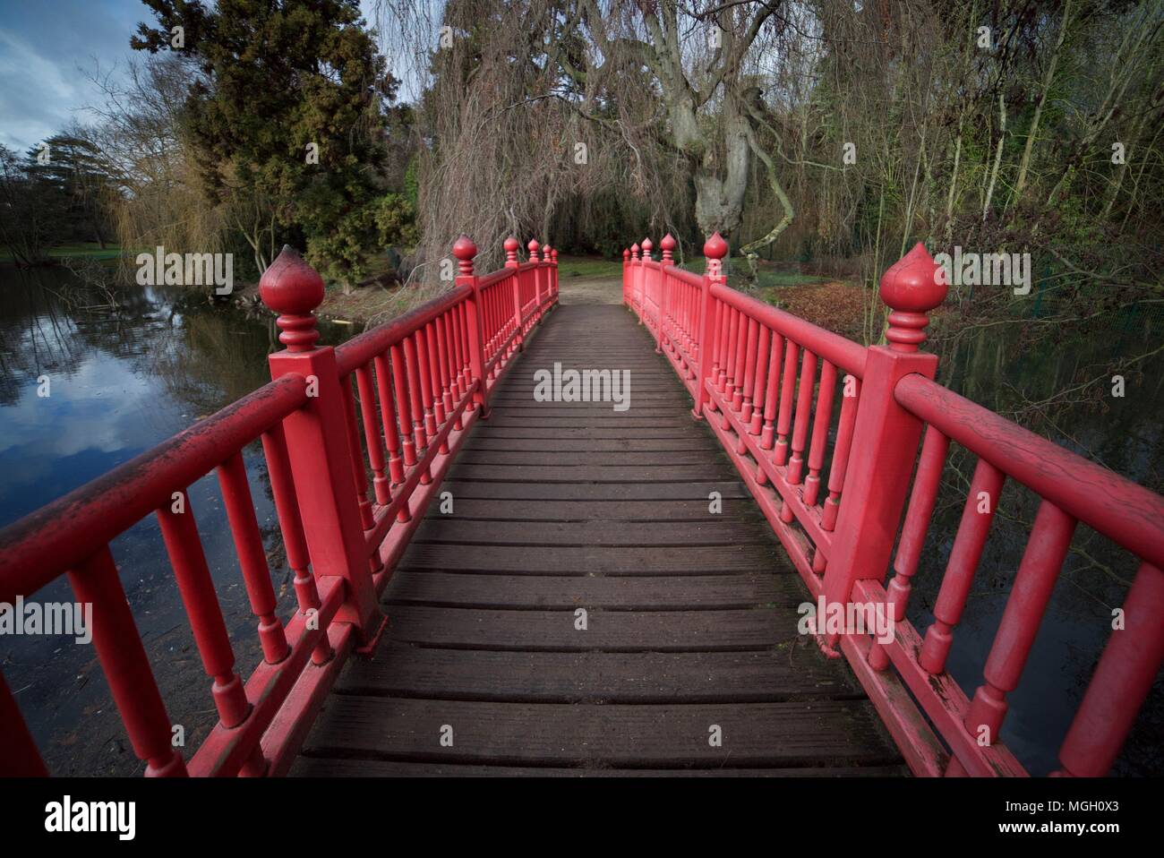 Traditional Asian red wooden bridge at parc boulogne-edmond de ...