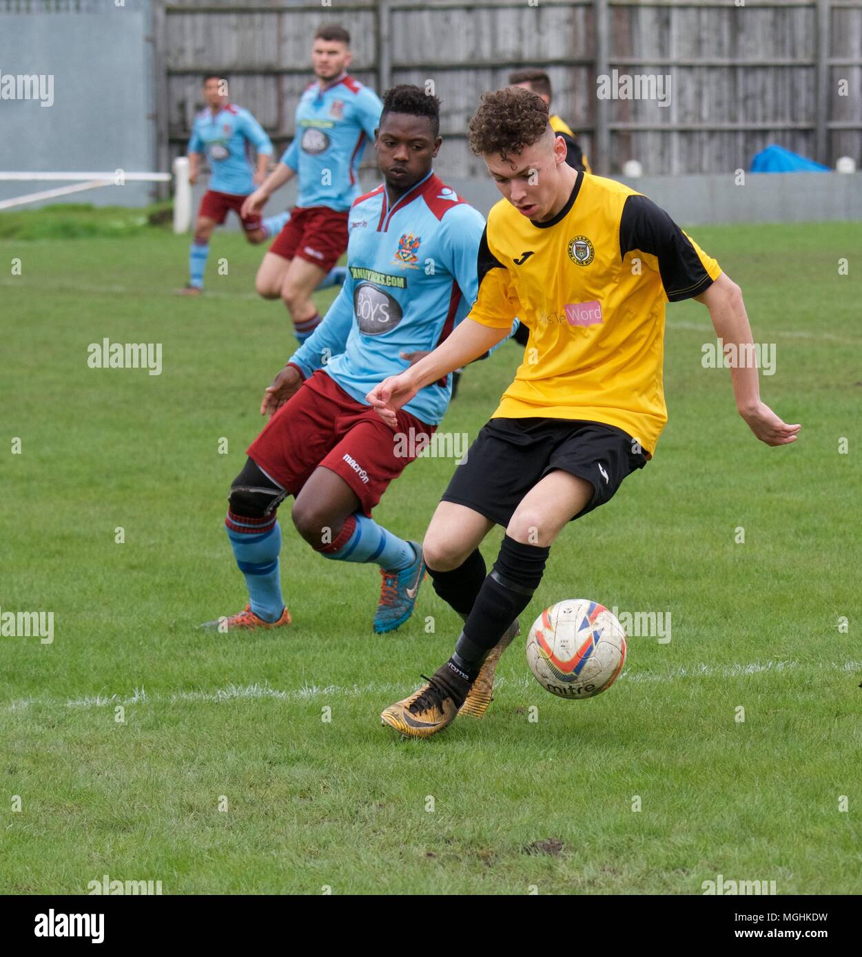Football action from the match between New Mills and Bacup Borough ...