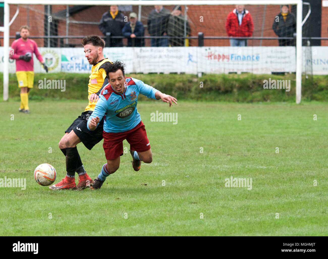 Football action from the match between New Mills and Bacup Borough ...