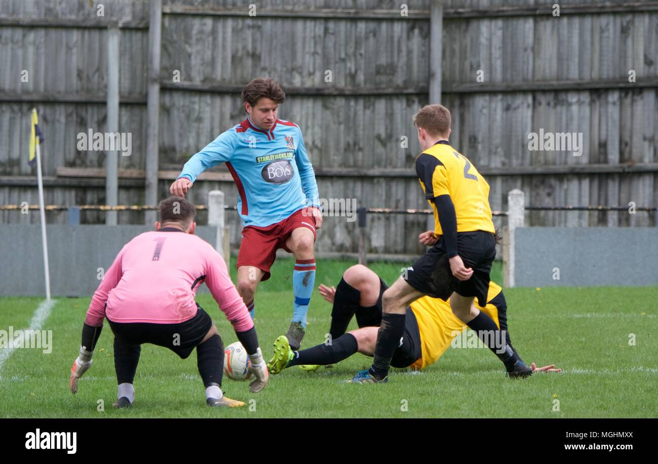Football action from the match between New Mills and Bacup Borough ...