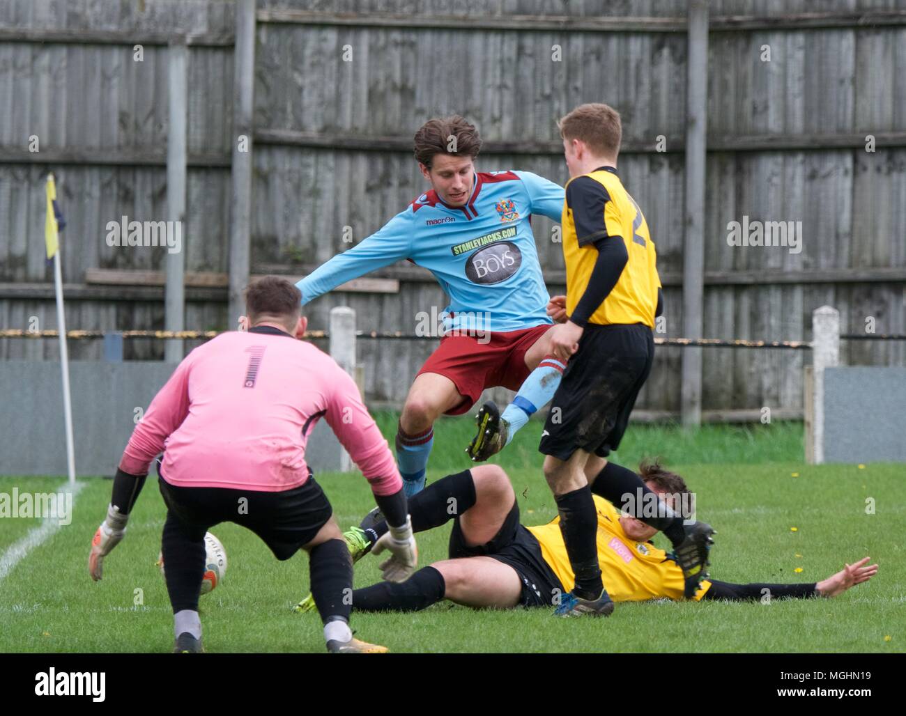 Football action from the match between New Mills and Bacup Borough ...