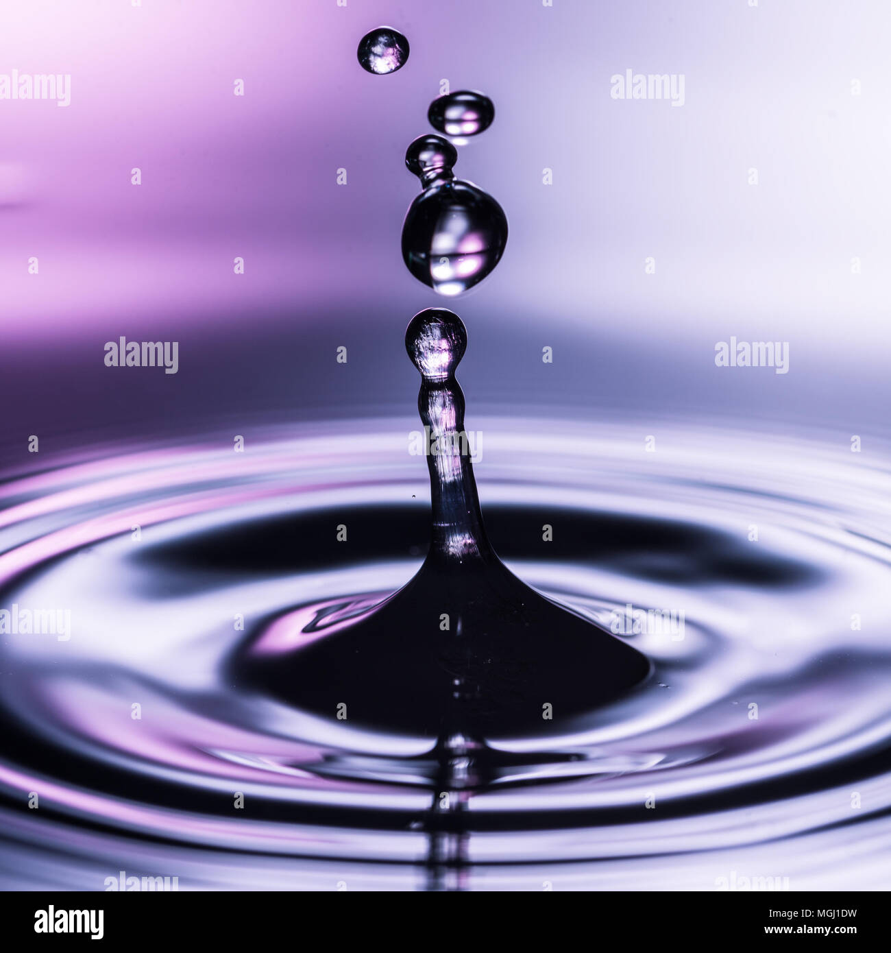 A macro shot of a water drop collision Stock Photo - Alamy