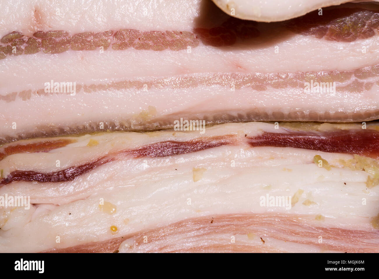 large juicy slices of fat bacon closeup Stock Photo - Alamy