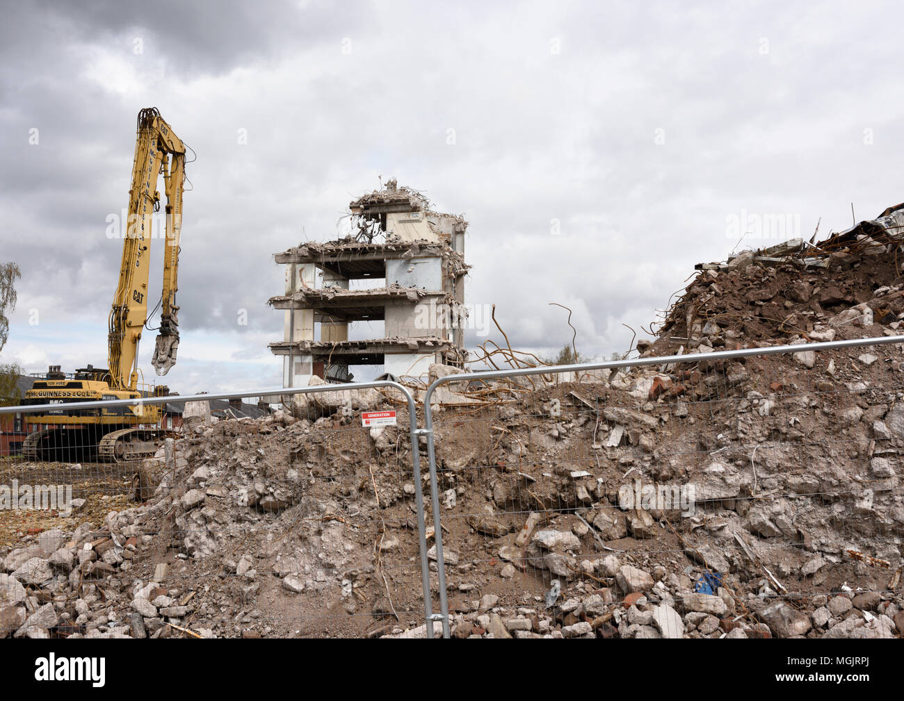 Concrete rubble on demolition site from controlled demolition of multi ... Concrete rubble on demolition site from controlled demolition of multi ...