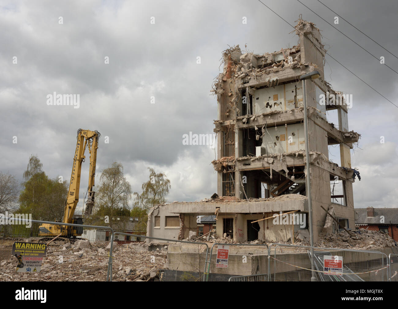 Demolition site, concrete rubble, partly demolished reinforced concrete ...